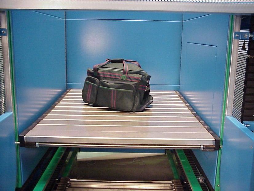 Vertical Baggage Conveyors Powered by Rubber Block Chain | NERAK Systems